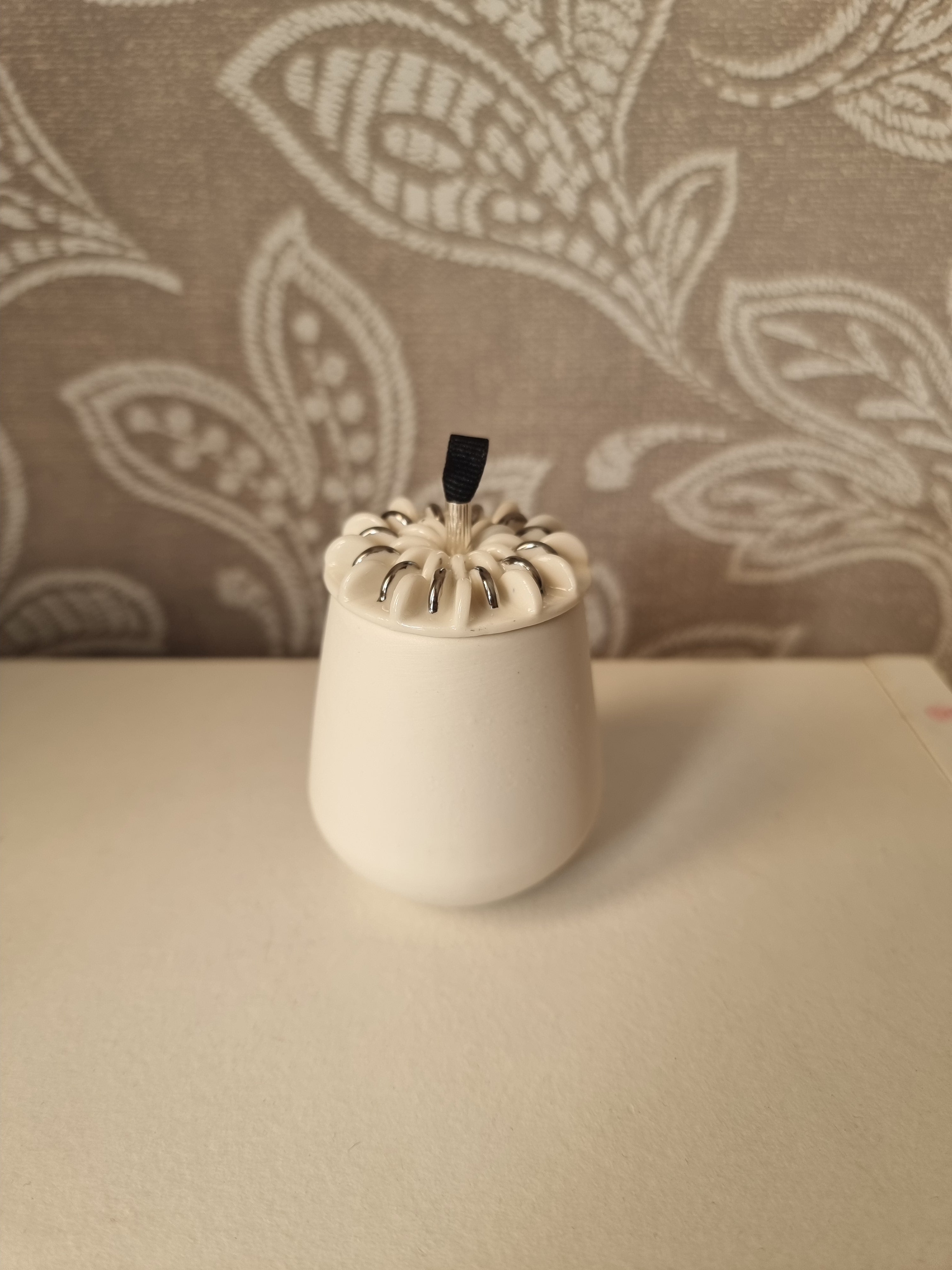 Small Lidded Vessel with Platinum Lustre (Second) – Ruth Harrison Ceramics